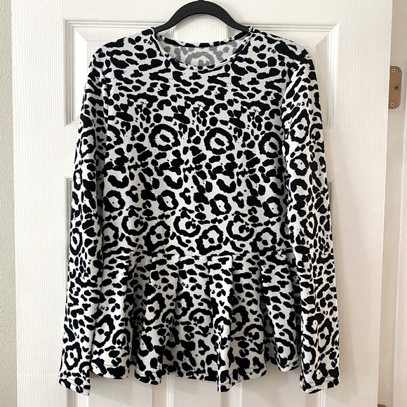 Private Label | Tops | Snow Leopard Peplum Top | Poshmark